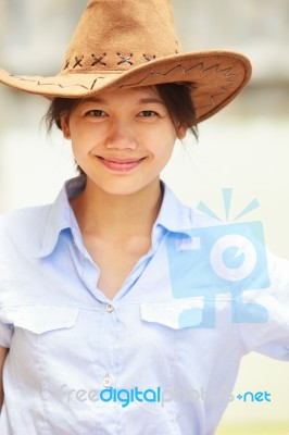 Asian Woman Wearing Cowboy Hat And Smiling Stock Photo - Royalty Free ...