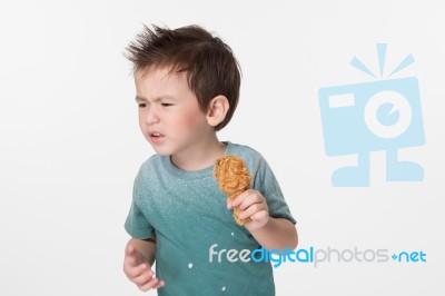 Boy Dislike Fried Chicken Stock Photo - Royalty Free Image ID 100165241