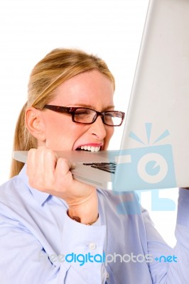 Business Lady Biting Laptop Stock Photo - Royalty Free Image ID 10063691
