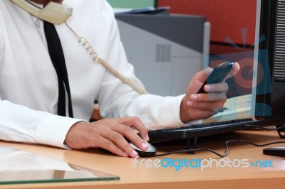 Businessman Using Smart Phone During Working Stock Photo - Royalty Free ...