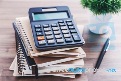Calculator On Office Desk Stock Photo - Royalty Free Image ID 100510076