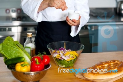 Chef Sprinkling Salt On Vegetables Stock Photo - Royalty Free Image ID ...