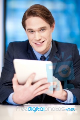 Corporate Guy Browsing On Tablet Pc Stock Photo - Royalty Free Image ID ...