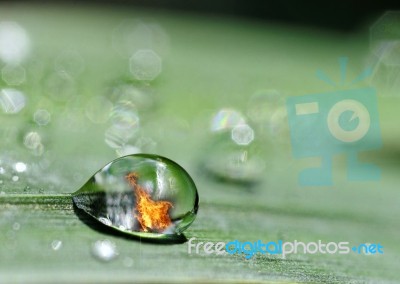 Fire Inside The Drop Of Water Stock Photo - Royalty Free Image ID 10052474