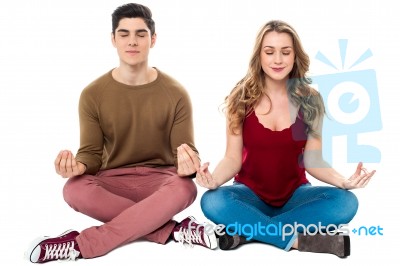 Friends Meditating In Lotus Pose, Peace Of Mind Stock Photo - Royalty ...