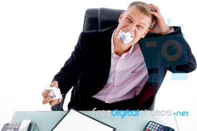 Frustrated Businessman eating Paper Stock Photo - Royalty Free Image ID ...