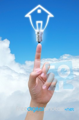 Hand Touching Light Bulb Stock Photo - Royalty Free Image ID 10065271