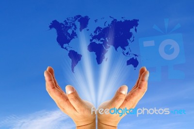 Human Hands Holding World Map Stock Photo - Royalty Free Image ID 10045525