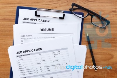 Job Application And Resume Stock Photo - Royalty Free Image ID 100558700