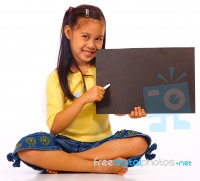 Kid Holding Board For Writing Stock Photo - Royalty Free Image ID 10055364