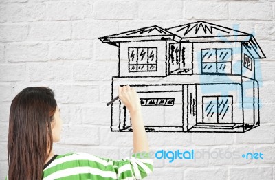 Lady Drawing House On Brick Wall Stock Photo - Royalty Free Image ID ...
