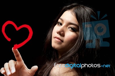 Lady Touching Heart Symbol Stock Photo - Royalty Free Image ID 10059789