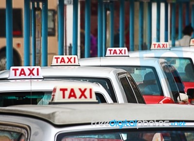 Line Of Taxis Stock Photo - Royalty Free Image ID 10055259