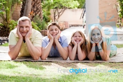 Lovely Family In Their Back Yard Stock Photo - Royalty Free Image ID ...