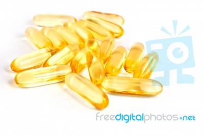 Pile Of Shiny Yellow Vitamin Capsules Stock Photo - Royalty Free Image ...