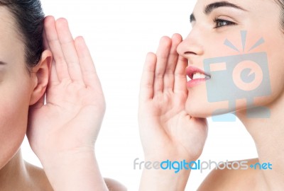 Pretty Girl Sharing A Secret With Her Friend Stock Photo - Royalty Free ...