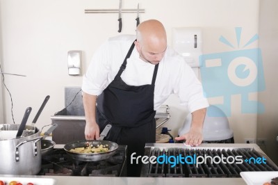 Professional Chef Cleaning The Kitchen Stock Photo - Royalty Free Image ...