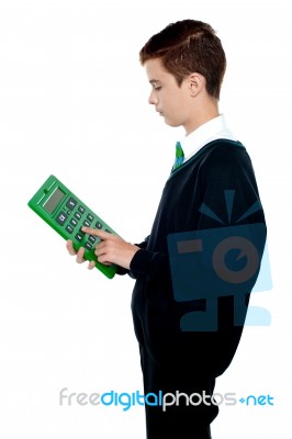 School Boy Using Calculator Stock Photo - Royalty Free Image ID 100102435