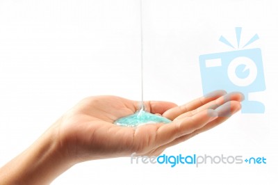 Shampoo pouring into hand Stock Photo - Royalty Free Image ID 10096106