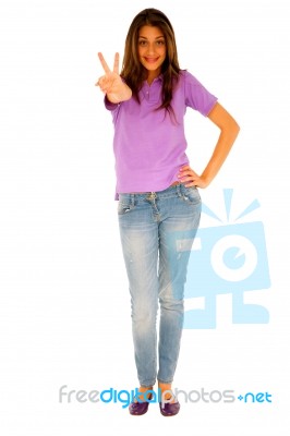 Teenage Girl Giving Peace Sign Stock Photo - Royalty Free Image ID 10095688